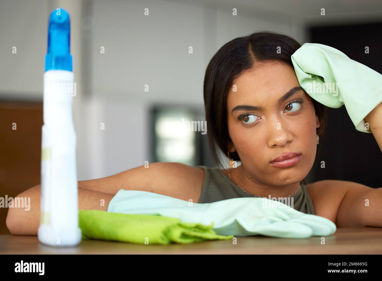 Spring cleaning, woman and sad thinking in home unhappy, bored and ...