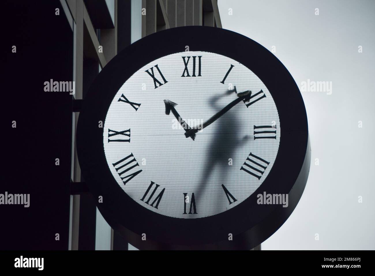 London, UK, 12th January 2023. A clock next to Paddington Station with ...