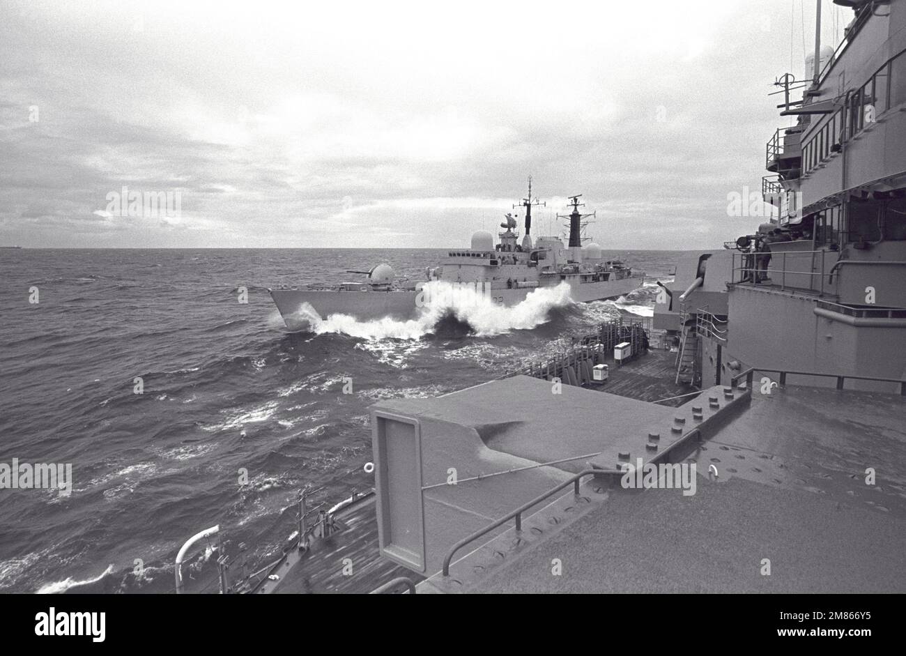 The British destroyer HMS LIVERPOOL (D-92) pulls alongside the ...