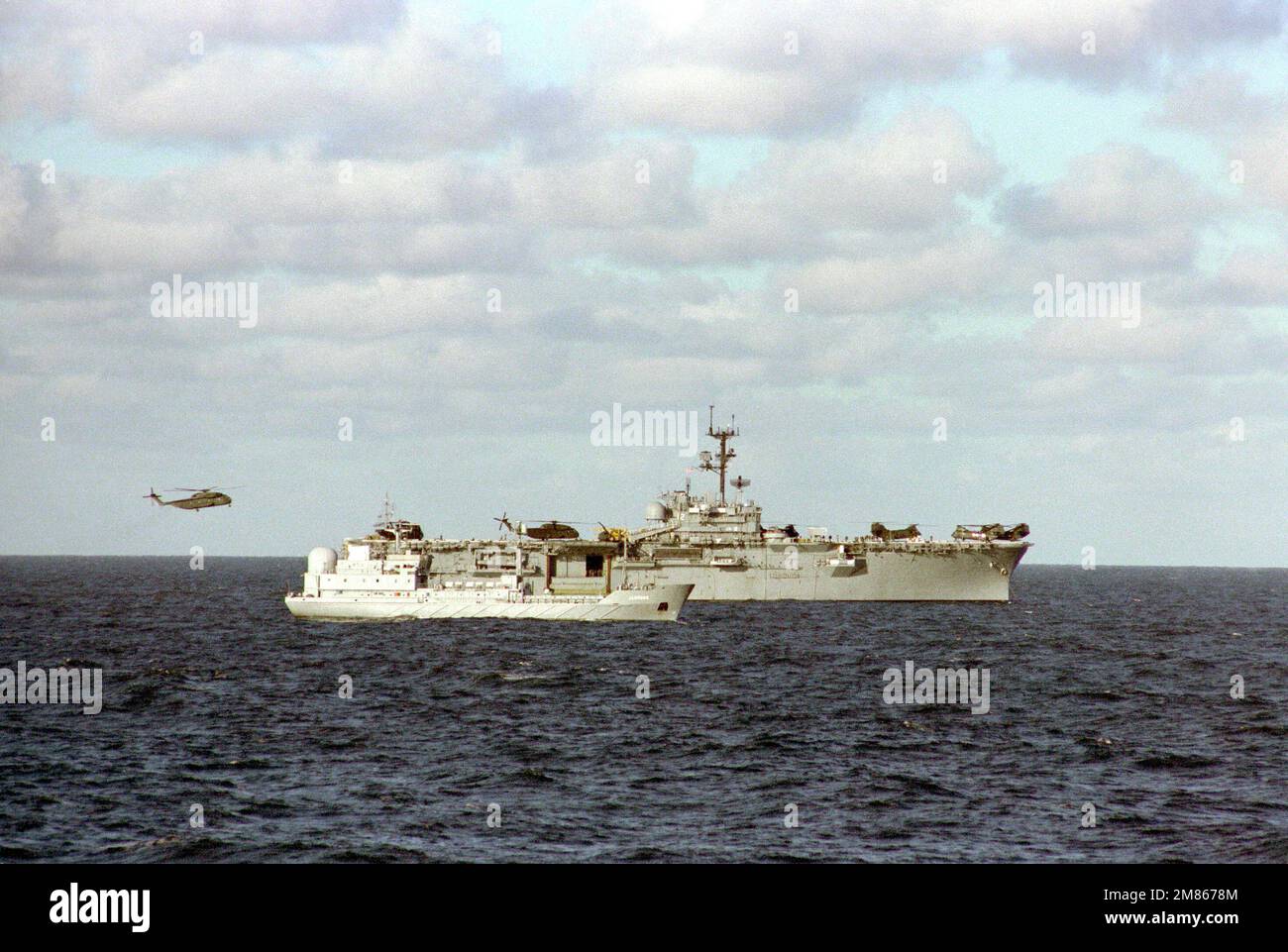 The East German intelligence ship JASMUND passes to starboard of the ...