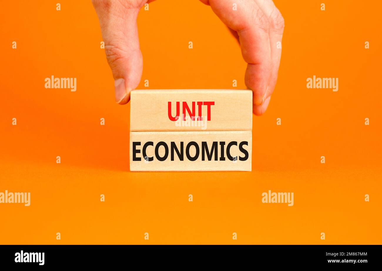 Unit economics symbol. Concept words Unit economics on wooden blocks ...