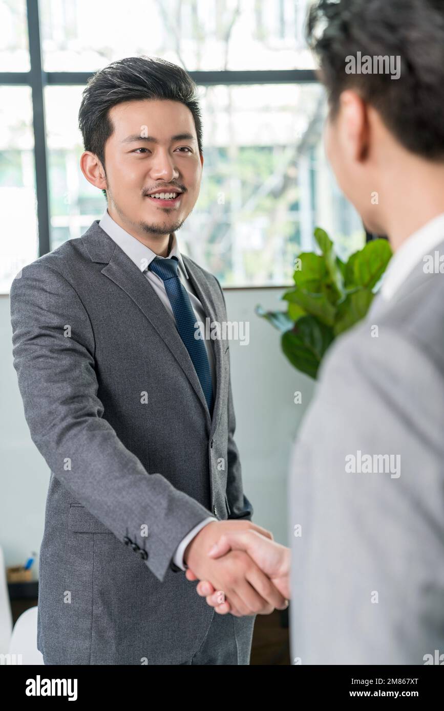 Business people shake hands Stock Photo - Alamy