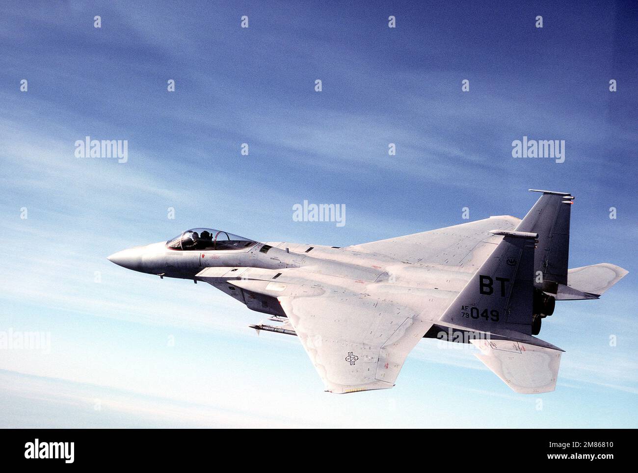 An air-to-air left top view of a 36th Tactical Fighter Wing F-15C Eagle ...