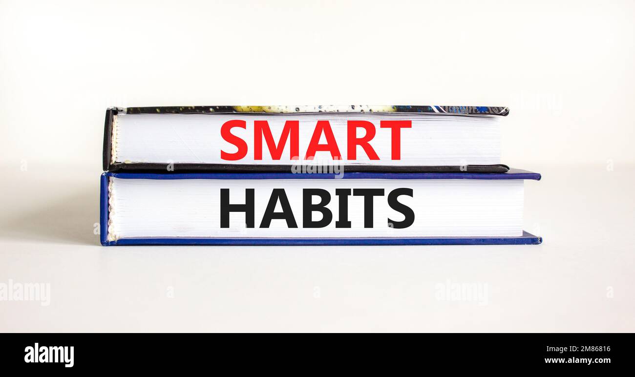 Smart habits symbol. Concept words Smart habits on books. Beautiful white table white background ...