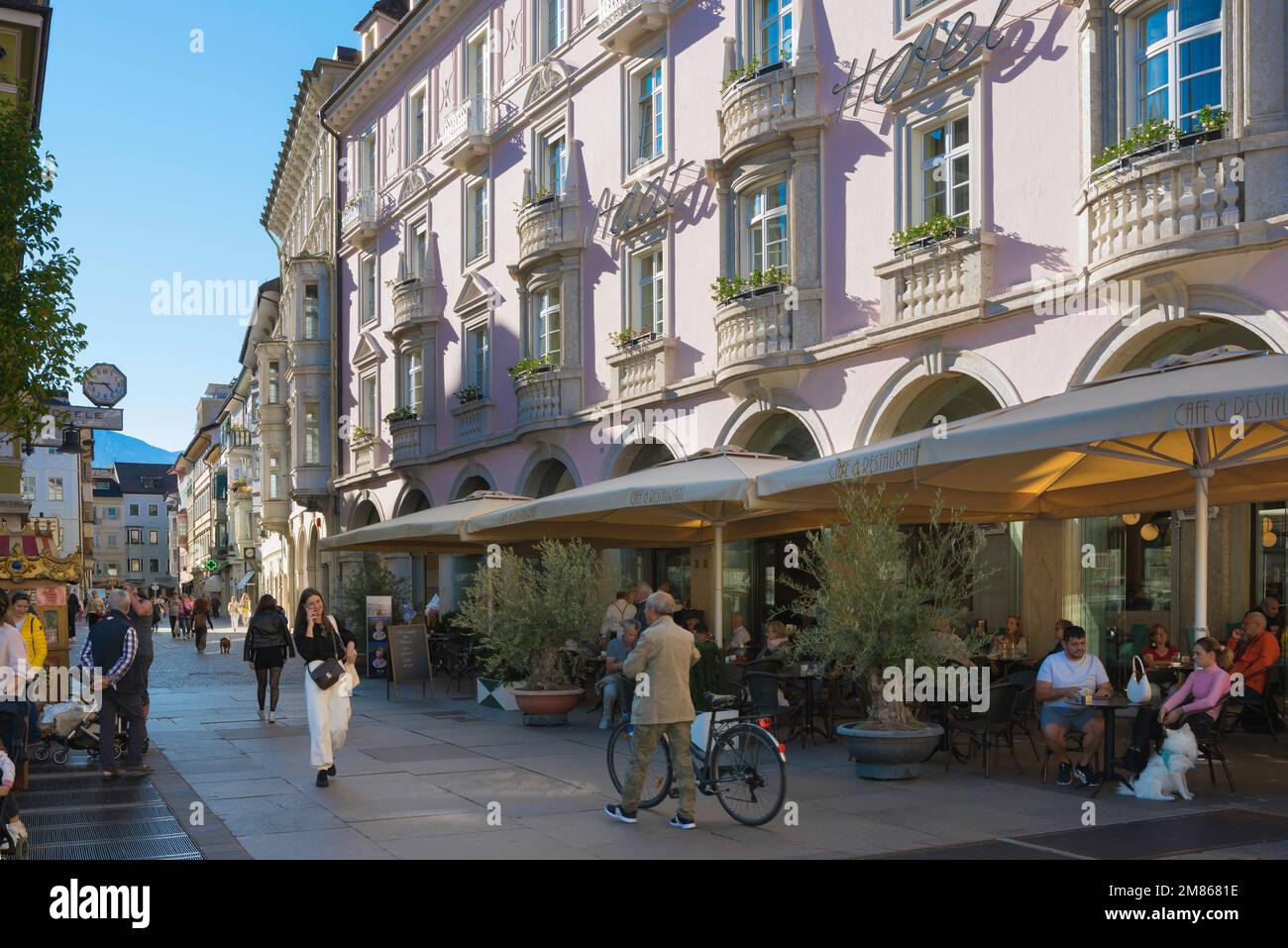 Bolzano city street, view in summer of the elegant facade of the Stadt ...