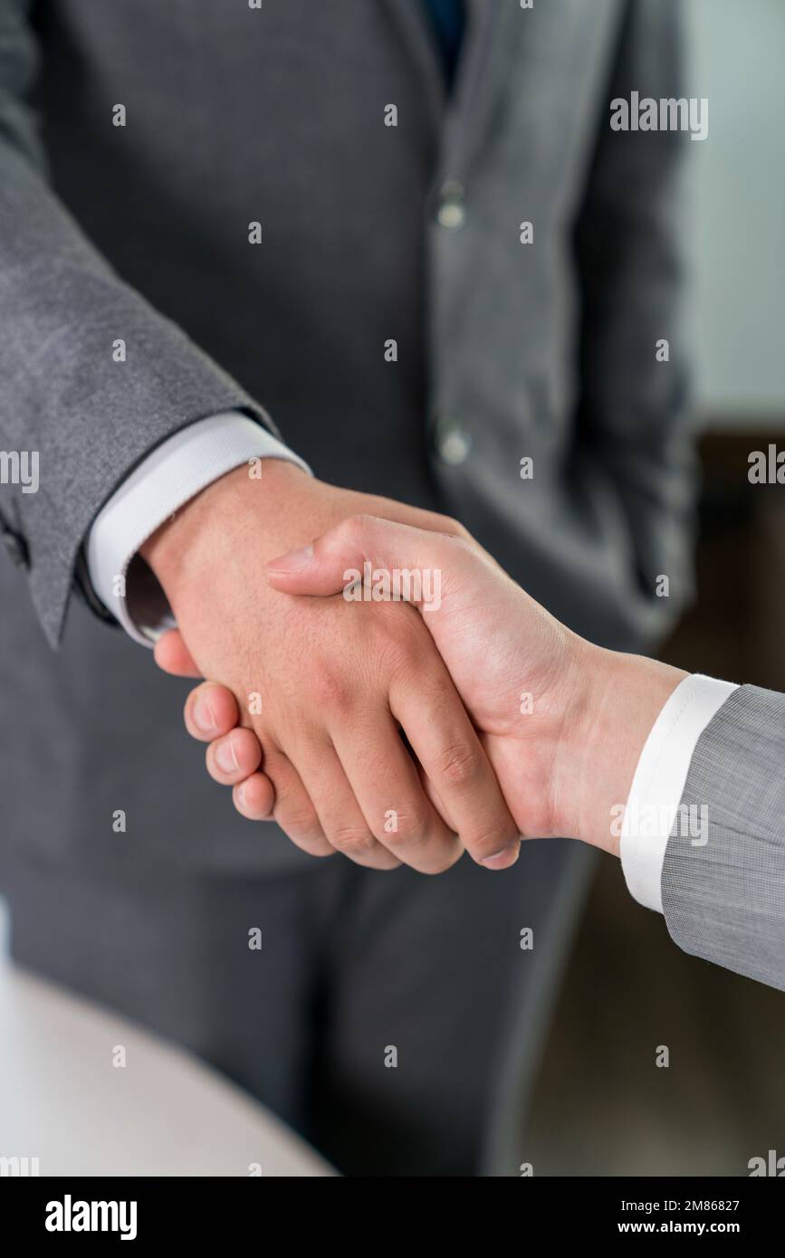 Business people shake hands Stock Photo - Alamy