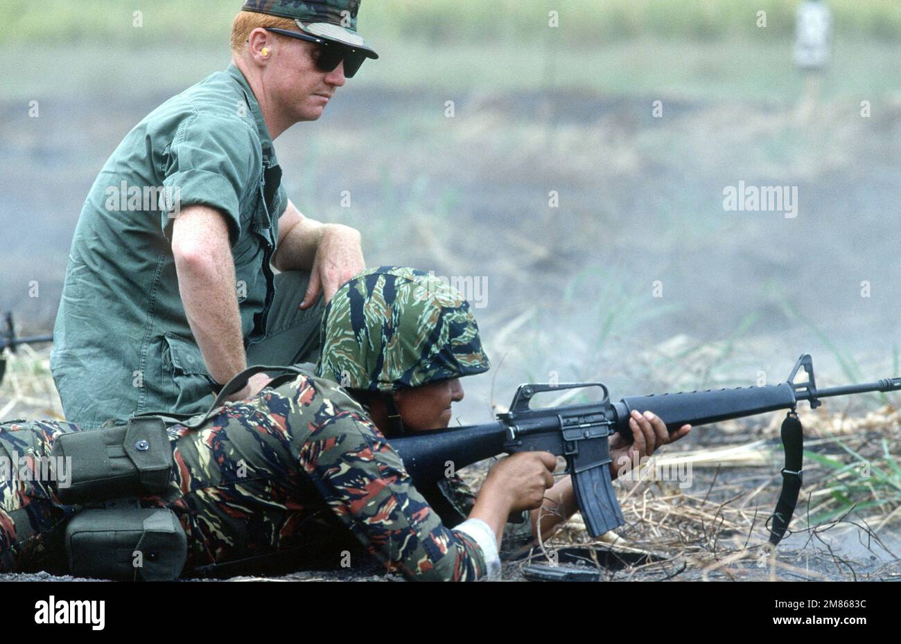 A staff sergeant from the Army's 193rd Infantry Brigade watches as an ...