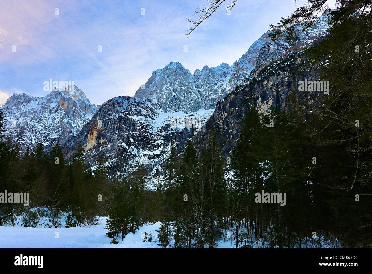 The dramatic snow-capped mountains of the Triglav National Park ...