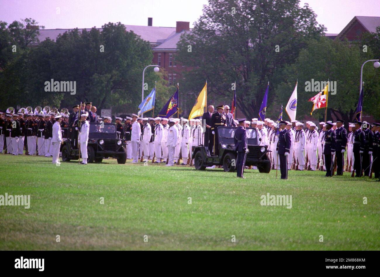 Military and civilian VIPs review ceremonial units from the Military ...