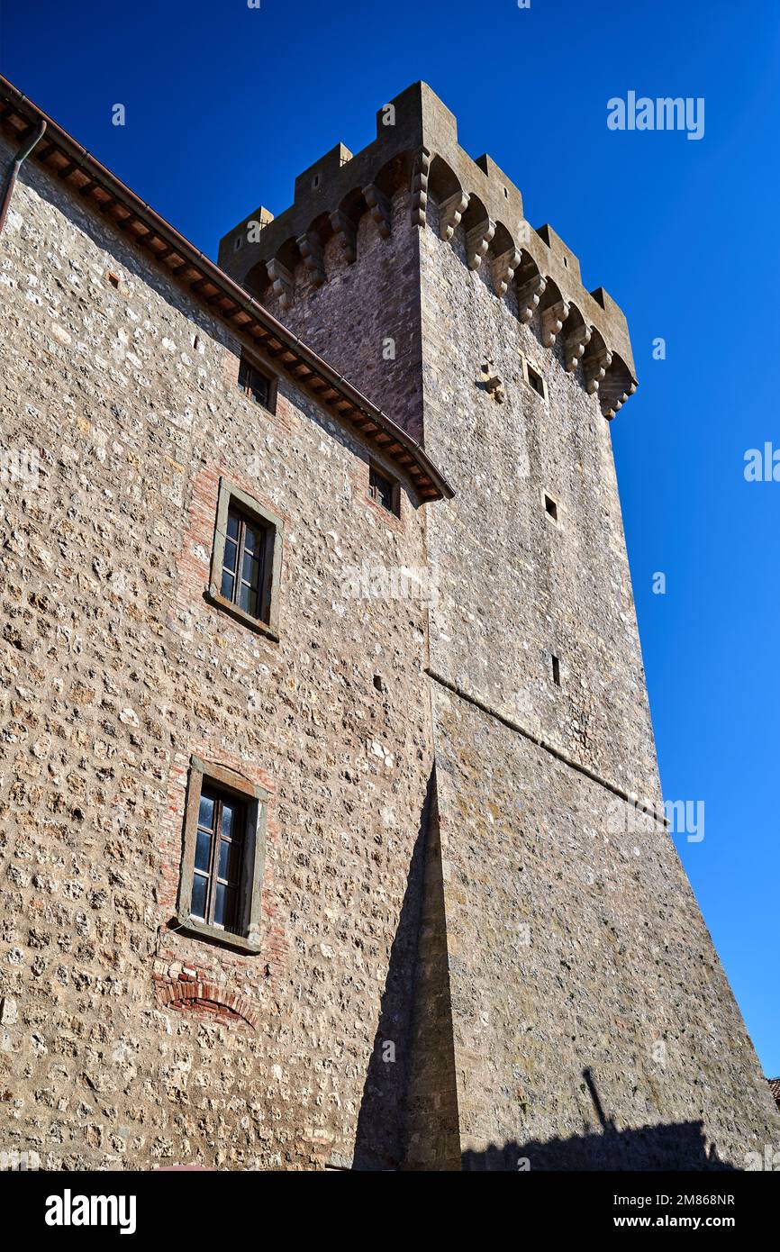 stone tower of a medieval castle in the village of Capalbio, Italia ...