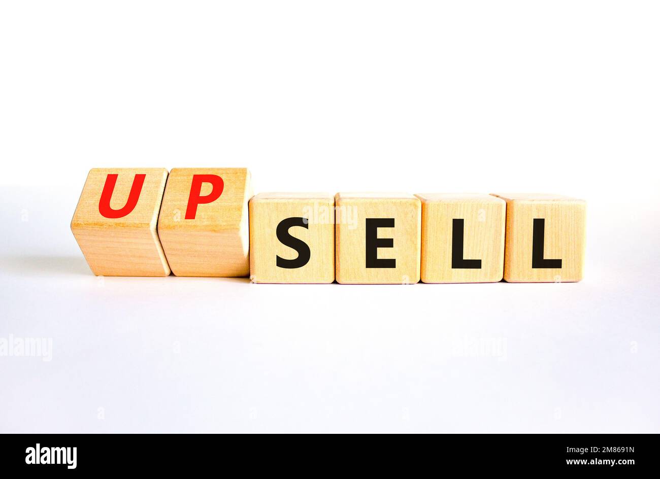 Sell or upsell symbol. Concept word Sell Upsell on wooden cubes ...