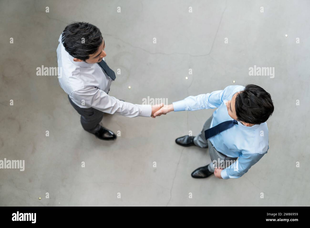 Business people shake hands Stock Photo - Alamy