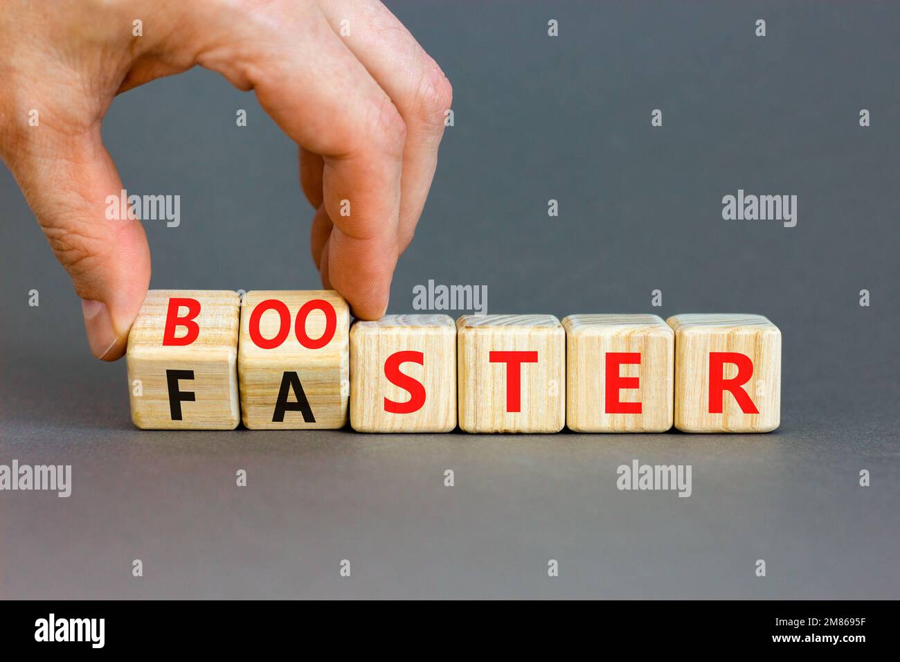 Booster and faster symbol. Concept word Booster Faster on wooden cubes ...