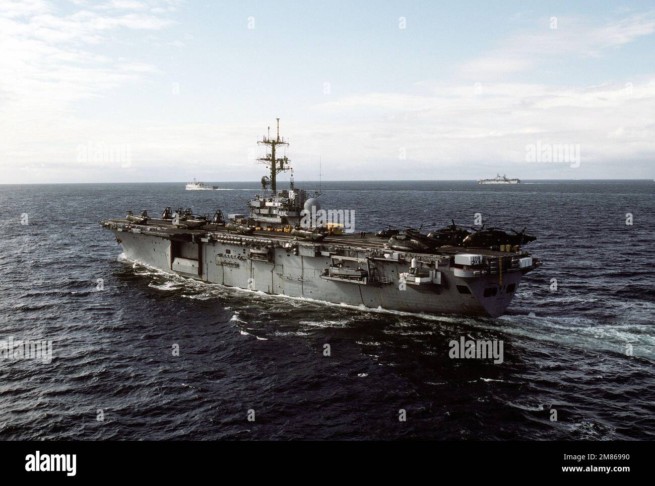 A port quarter view of the amphibious assault ship USS INCHON (LPH-12 ...
