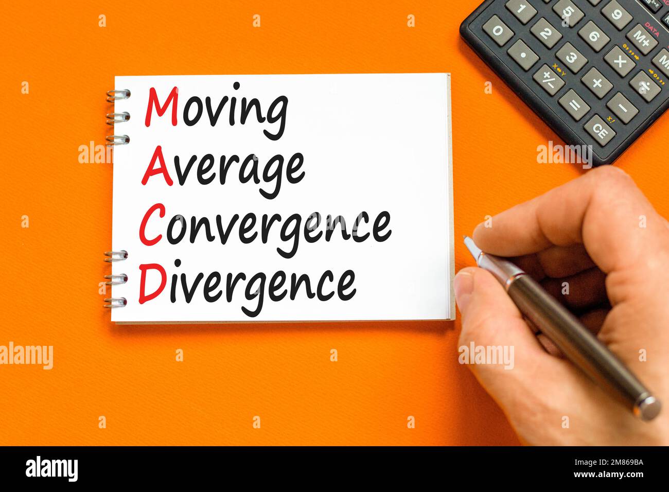MACD symbol. Concept words MACD moving average convergence divergence on white note on beautiful ...