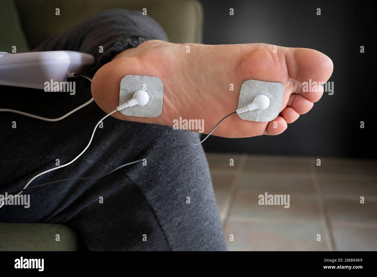 TENS Therapy for heel pain or Plantar Fasciitis, self-administered at ...