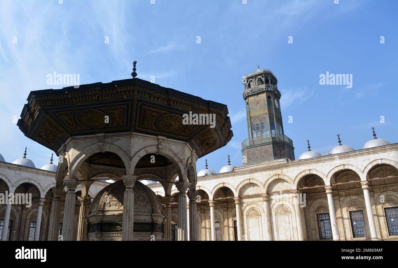 Ablution fountain and the clock tower in courtyard of The great mosque ...