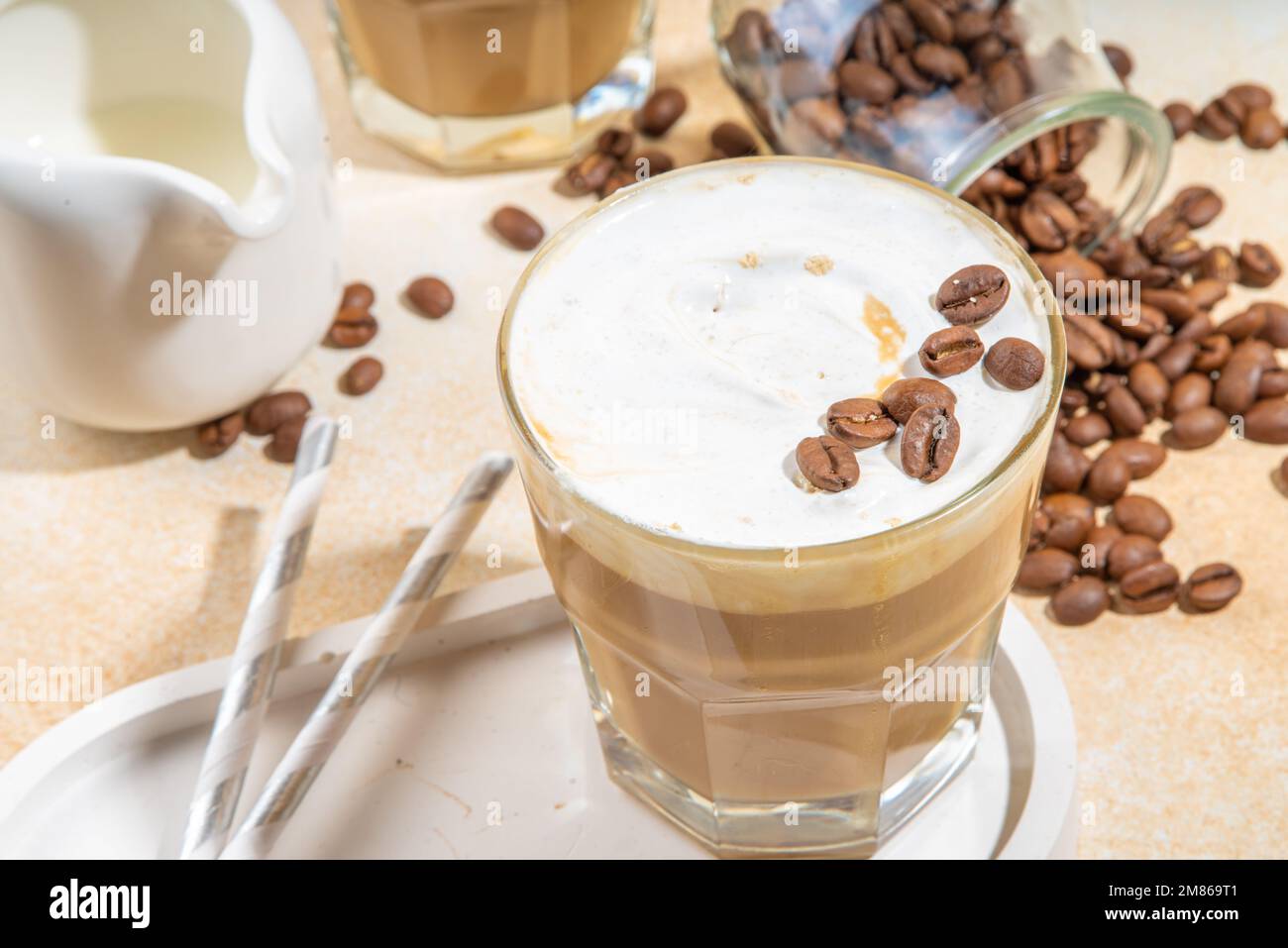 Cold dairy coffee drink with milk, whipped cream. Foamy frappe, latte ...