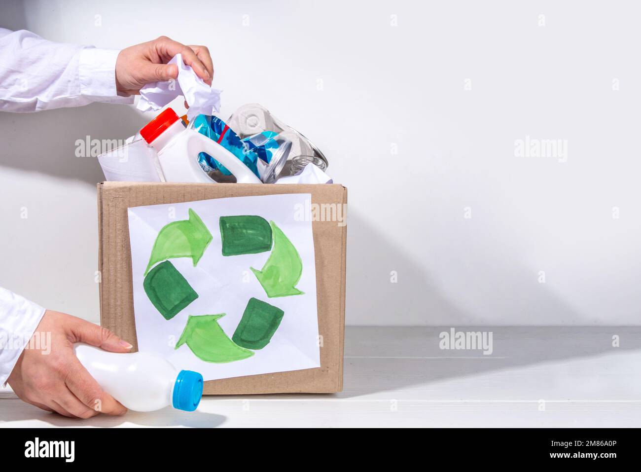 Garbage sorting, waste recycling concept. Box with recycling materials ...