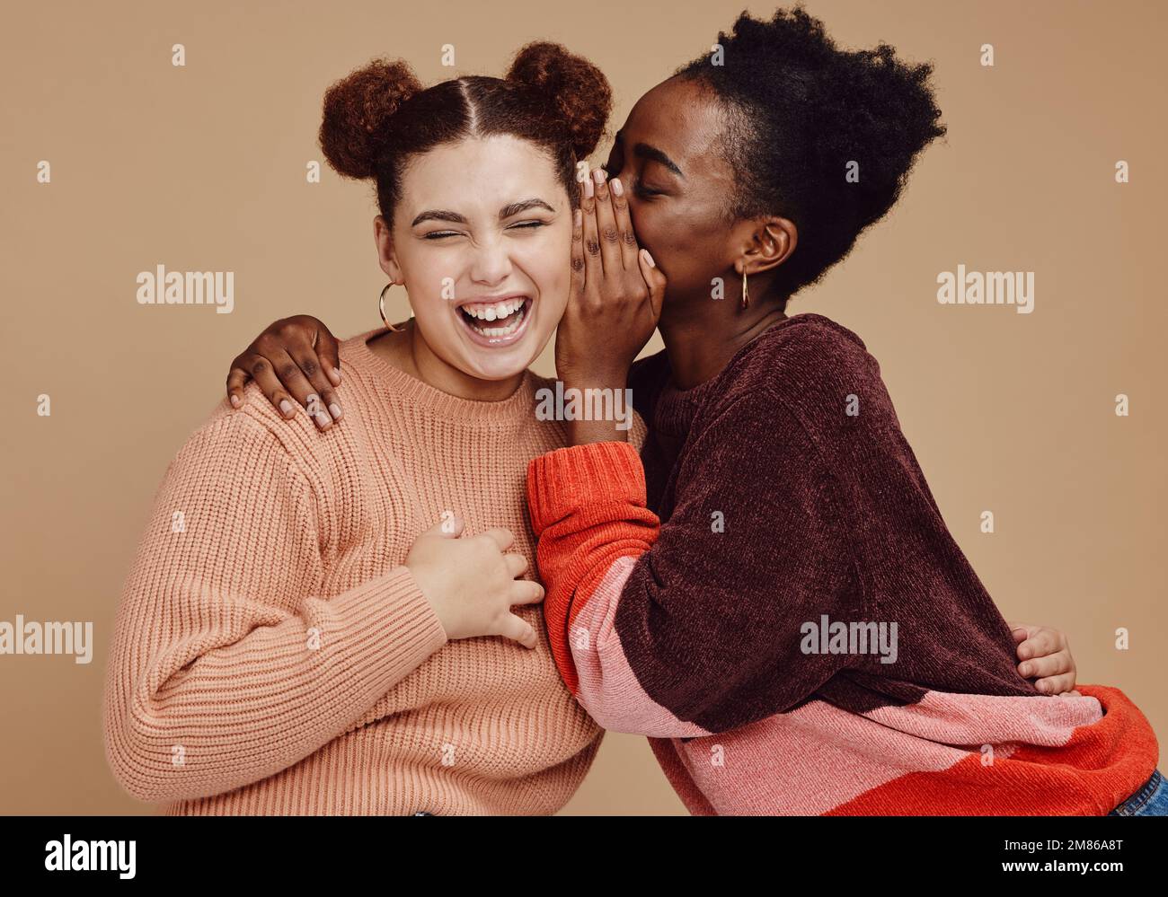 Friends, gossip and women laughing at secret joke on studio background ...