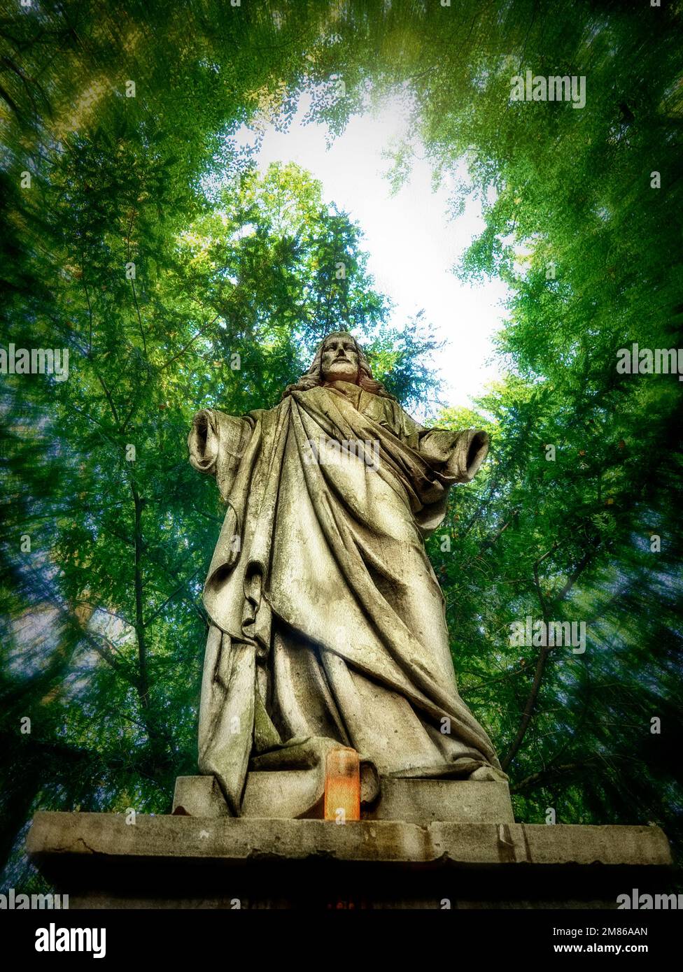 Old damaged stone statue of Jesus Christ / Jesus of Nazareth photographed in a wood Stock Photo ...