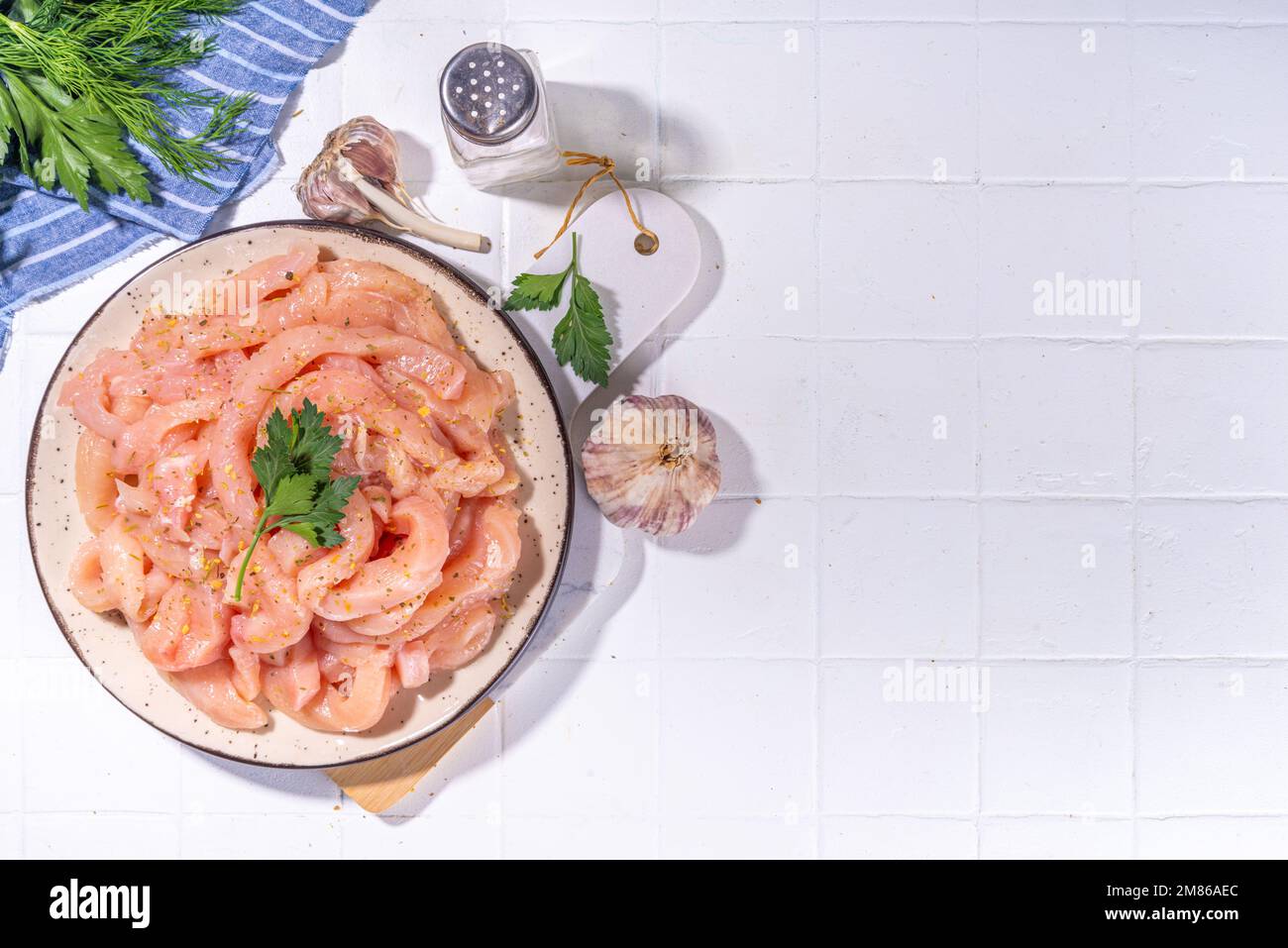 Cooking diet white poultry meat background. Fresh sliced chicken strips ...