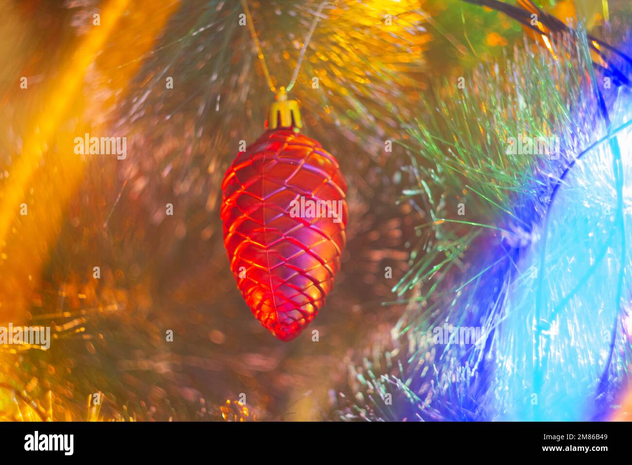 Christmas decorations and colored lights garlands on Christmas tree ...