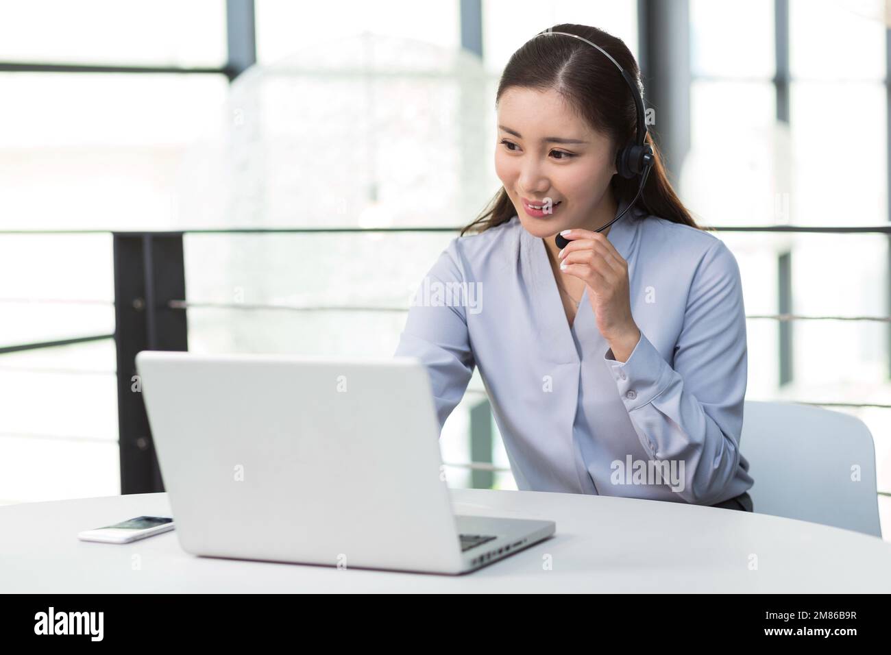 Women in answering the hotline service Stock Photo - Alamy