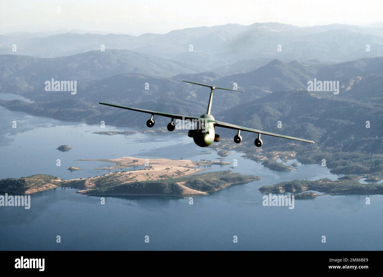 Air to air front view of a Air Mobility Command's 60th Airlift Wing C ...