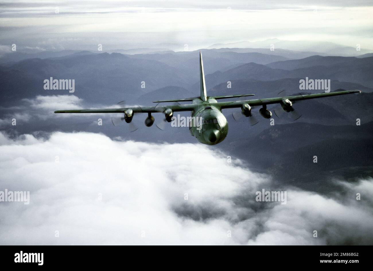 Air to air front, top view of an Air Mobility Command's C-130 Hercules ...