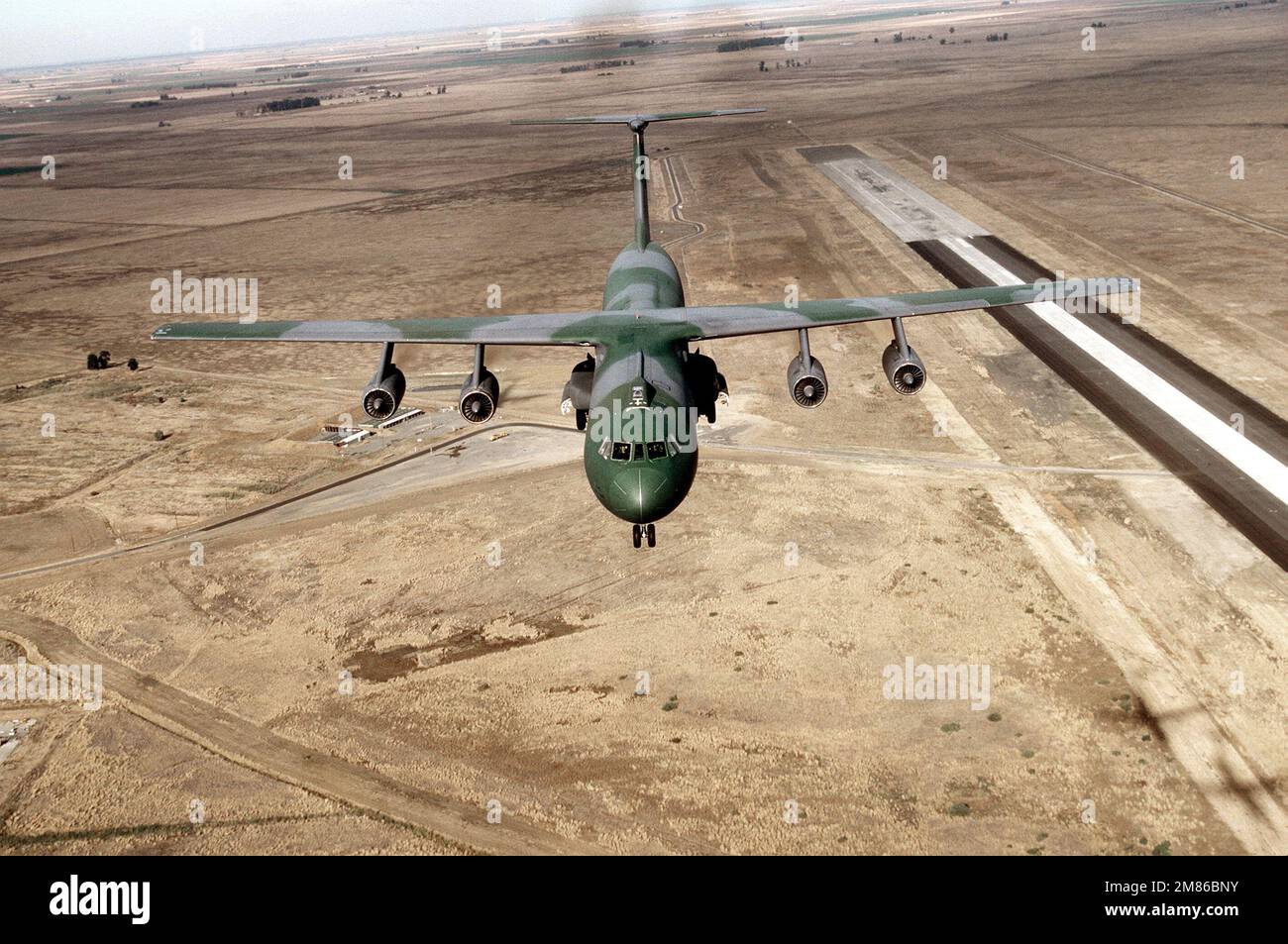 Air to air front view of a C-141 Starlifter, assigned to the 60th ...