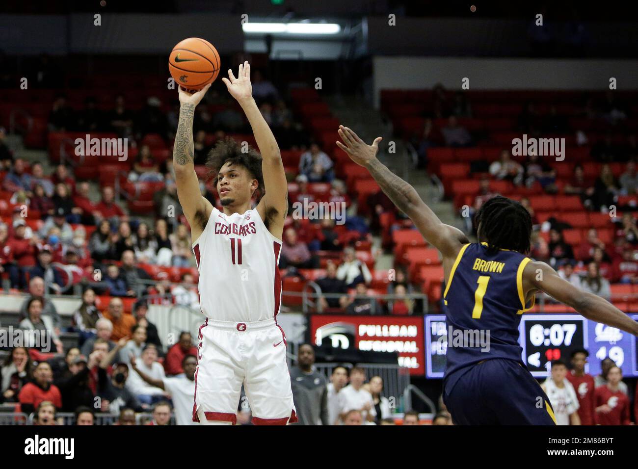 Washington State forward DJ Rodman (11) shoots while defended by ...