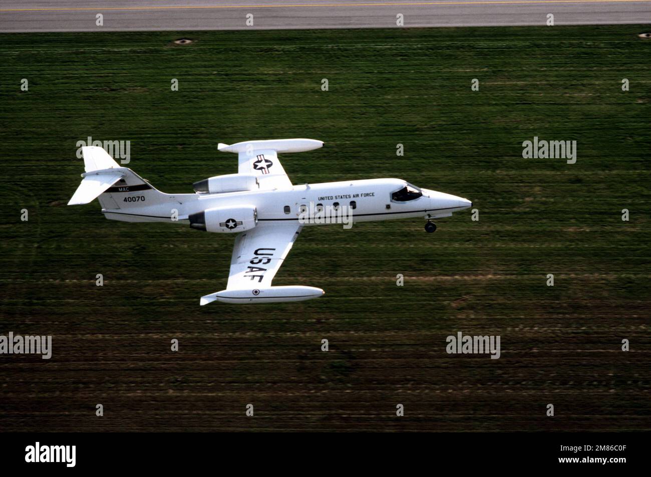 Air to air side view of Air Mobility Command's 375th Military Airlift ...