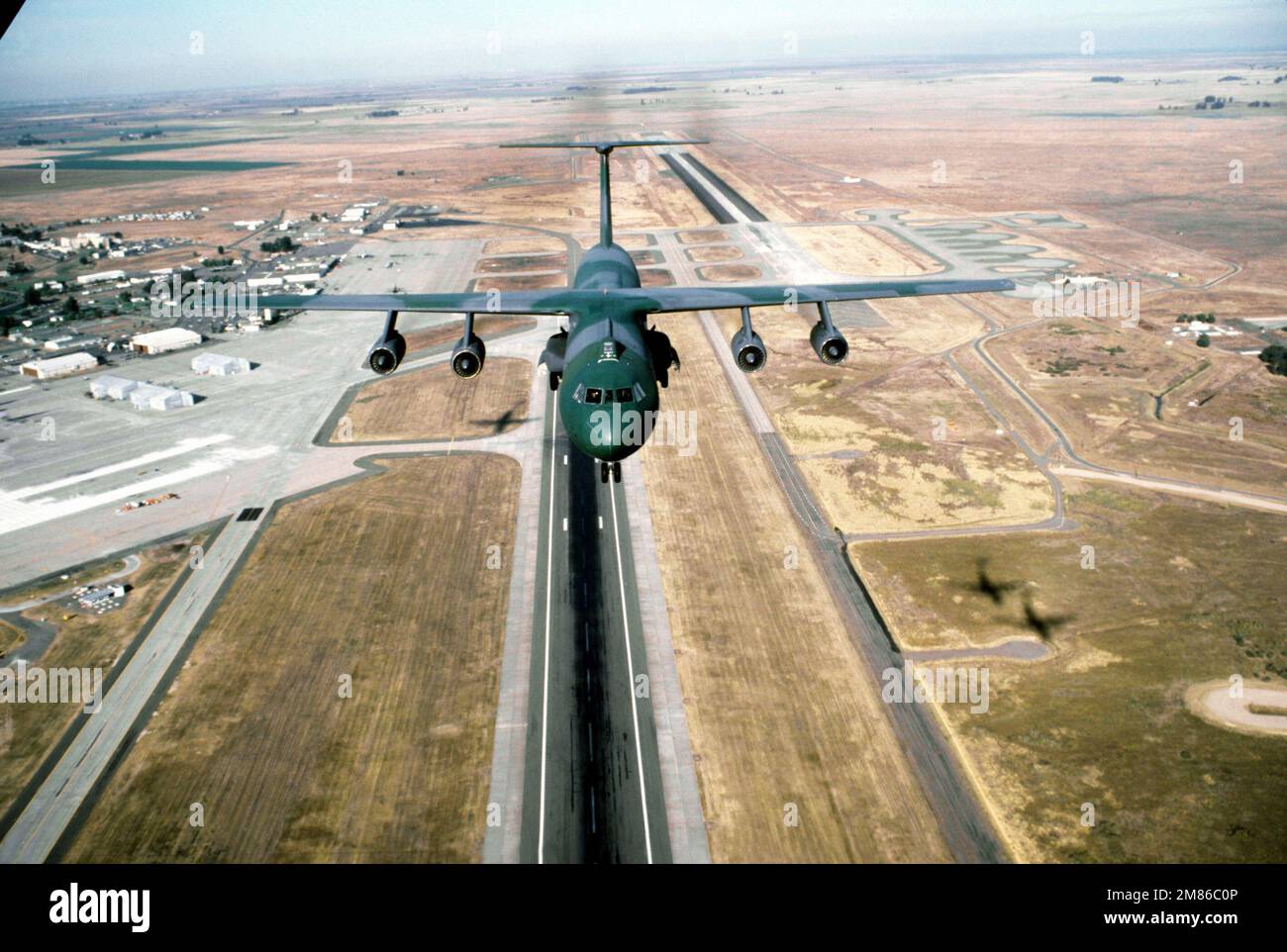 Air to air front view of Air Mobility Command's 60th Military Airlift ...