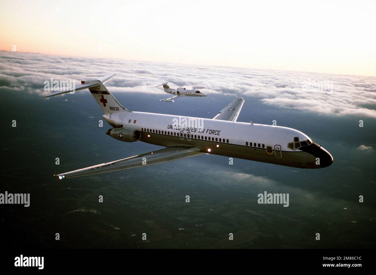 Air to air side view of Air Mobility Command's 375th Military Airlift ...