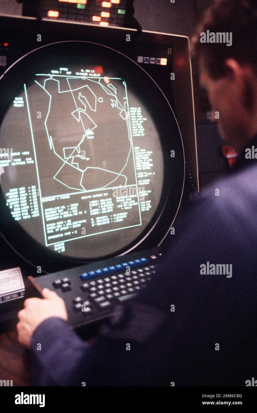 STAFF SGT. Paul Brawner of the 6th Missile Warning Squadron studies a radar screen for the AN ...