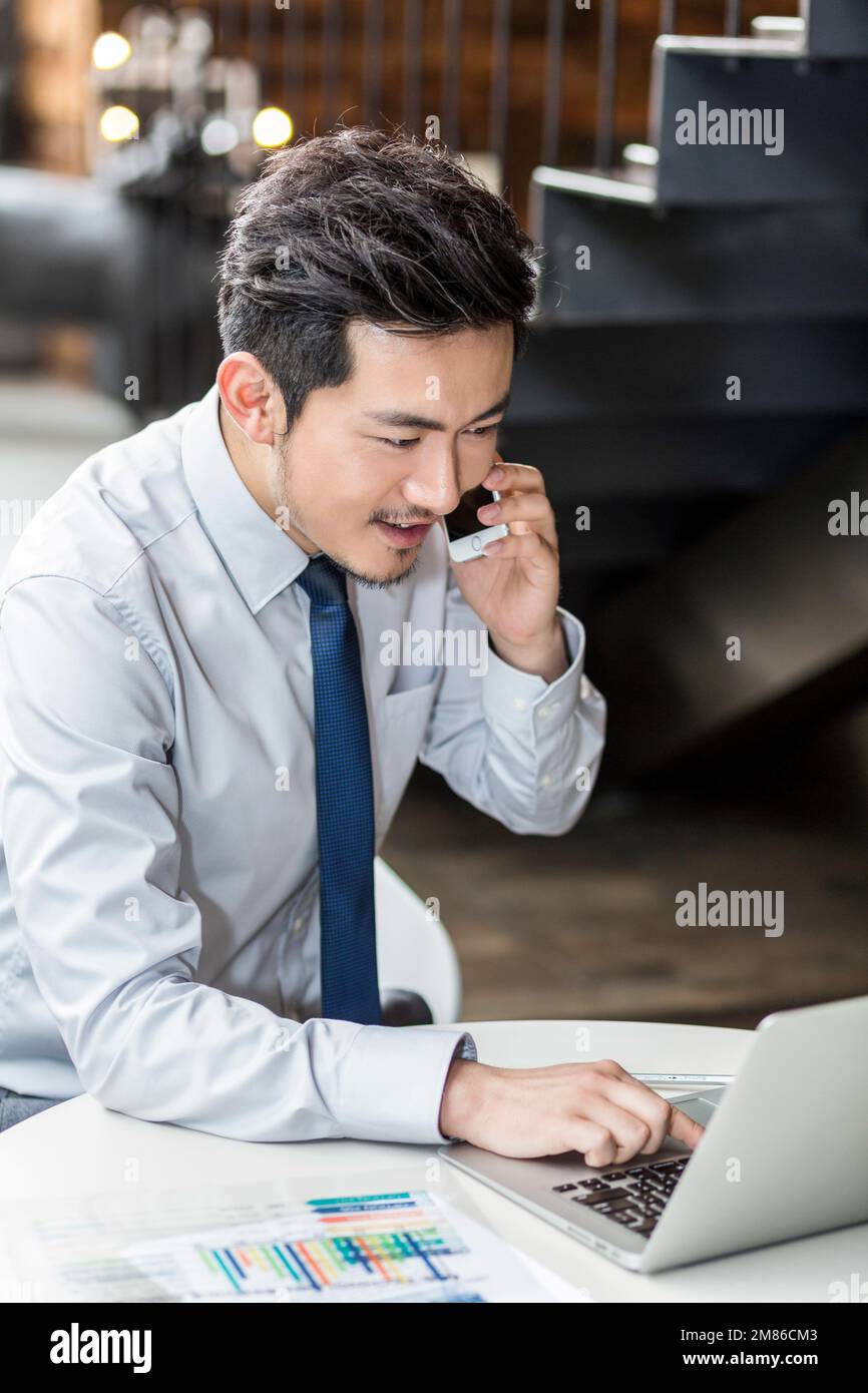 Business people make a phone call in the meeting room Stock Photo - Alamy