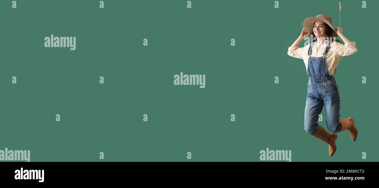 Jumping female farmer on green background with space for text Stock ...