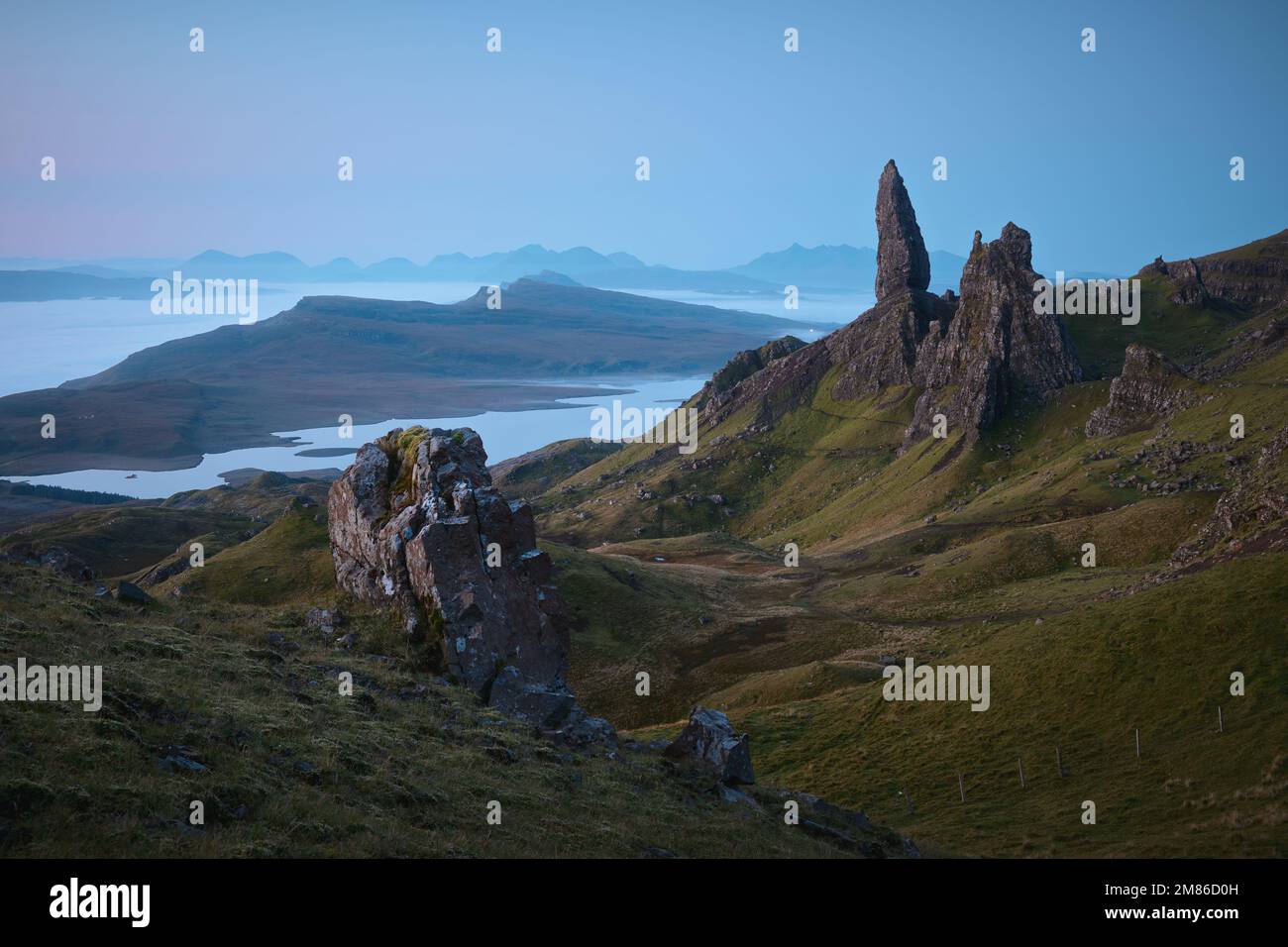 Atmospheric view from above of the tall, sharp cliffs overlooking the ...