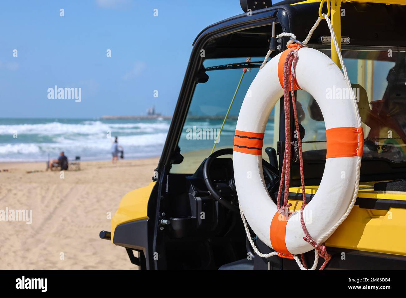 Lifeguard car with ring buoy at sea resort Stock Photo - Alamy