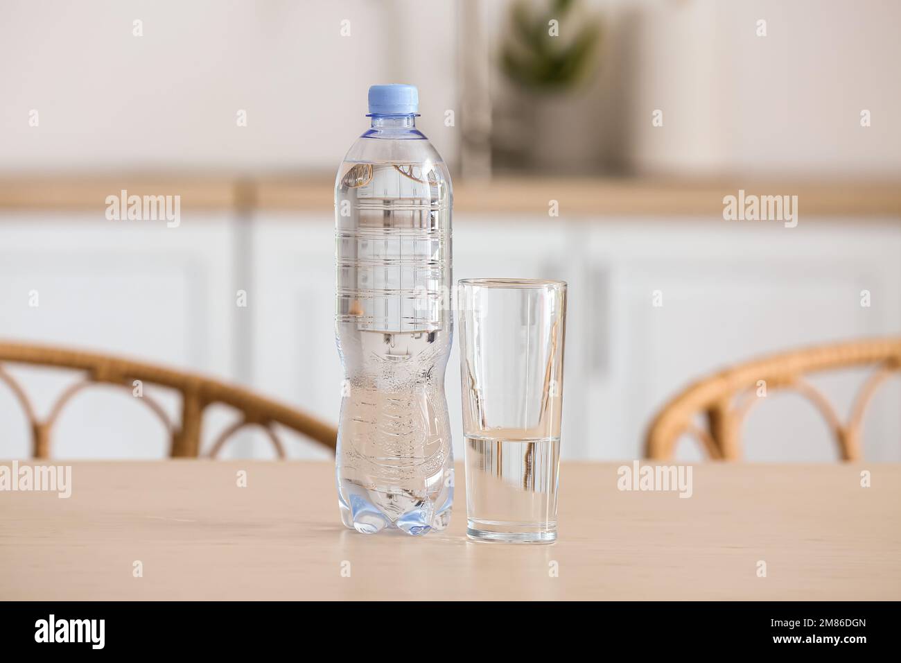 Plastic water bottle dining table hi-res stock photography and images ...