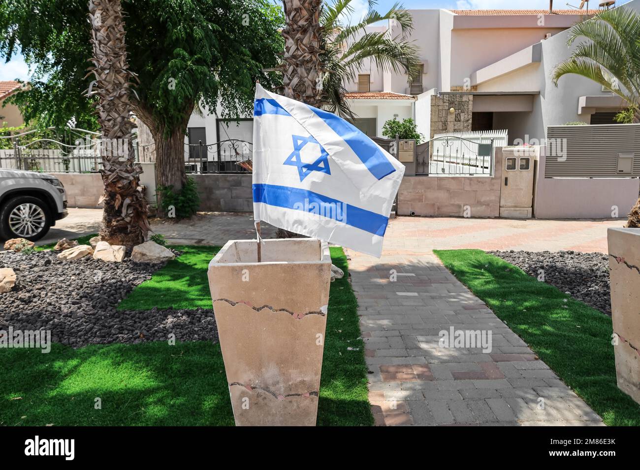 Stand with flag of Israel on city street Stock Photo - Alamy