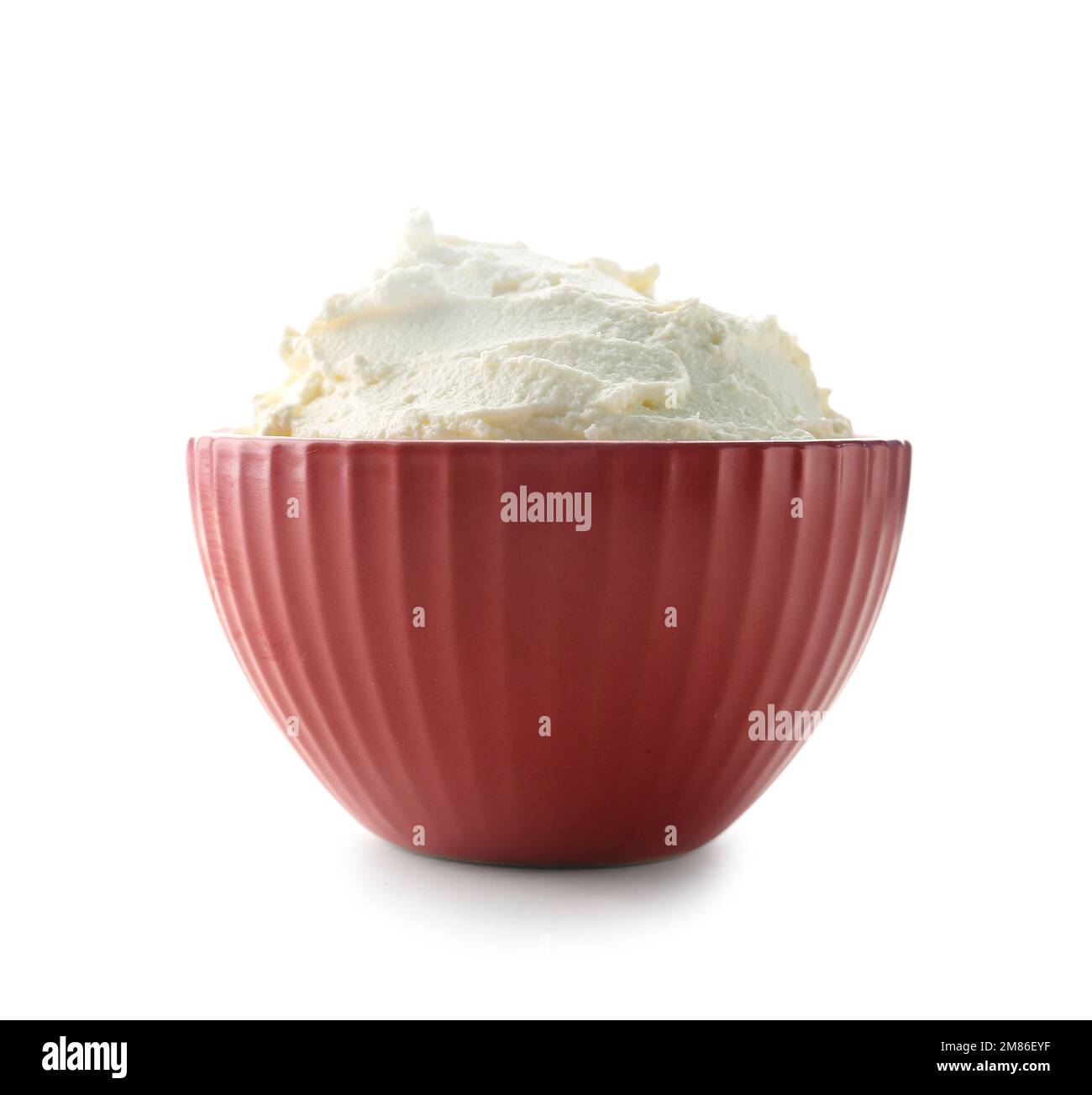 Bowl of tasty cream cheese isolated on white background Stock Photo - Alamy