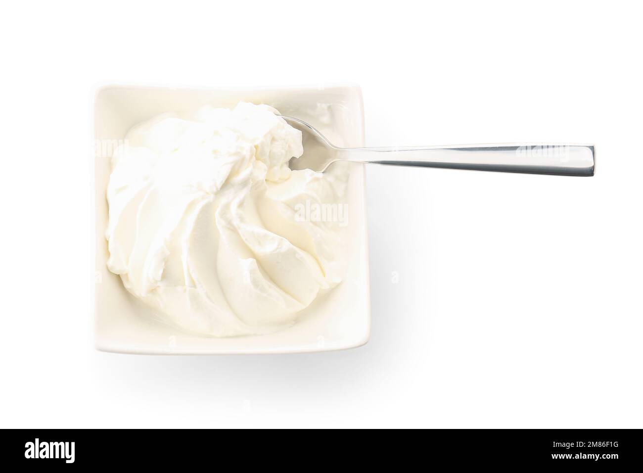 Bowl of delicious cream cheese on white background Stock Photo - Alamy