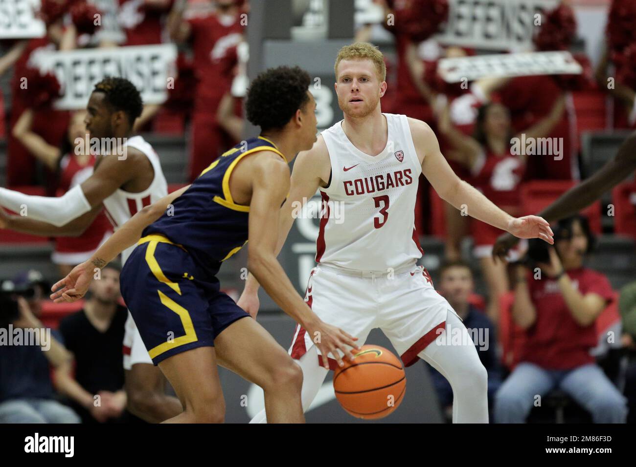 Washington State guard Jabe Mullins, right, defends California forward ...