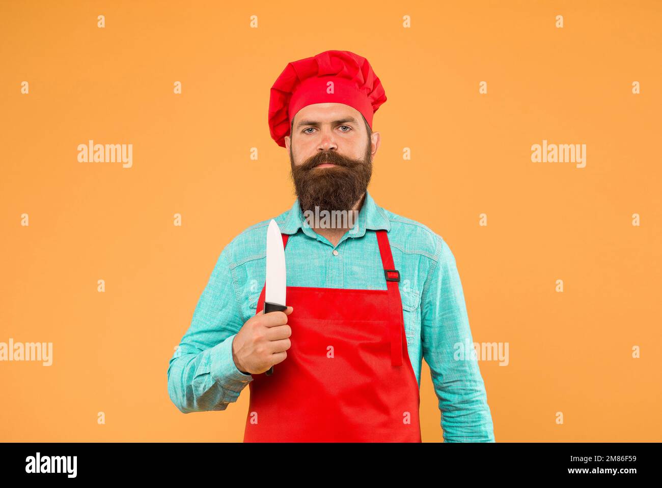Safety first. Chef using ceramic knife sharp edge useful for cutting ...