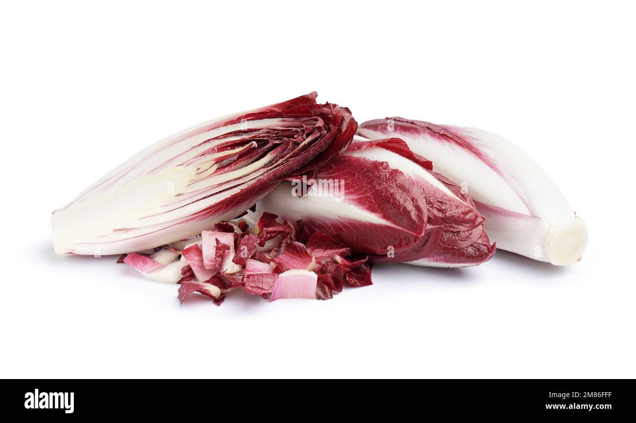 Heap of whole and cut red endive on white background Stock Photo - Alamy