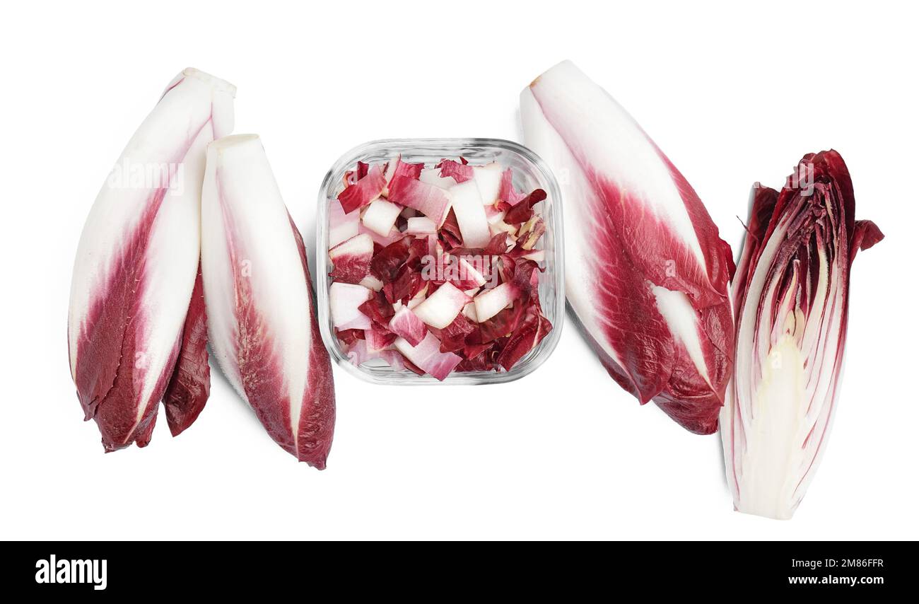 Glass bowl of cut red endive on white background Stock Photo - Alamy