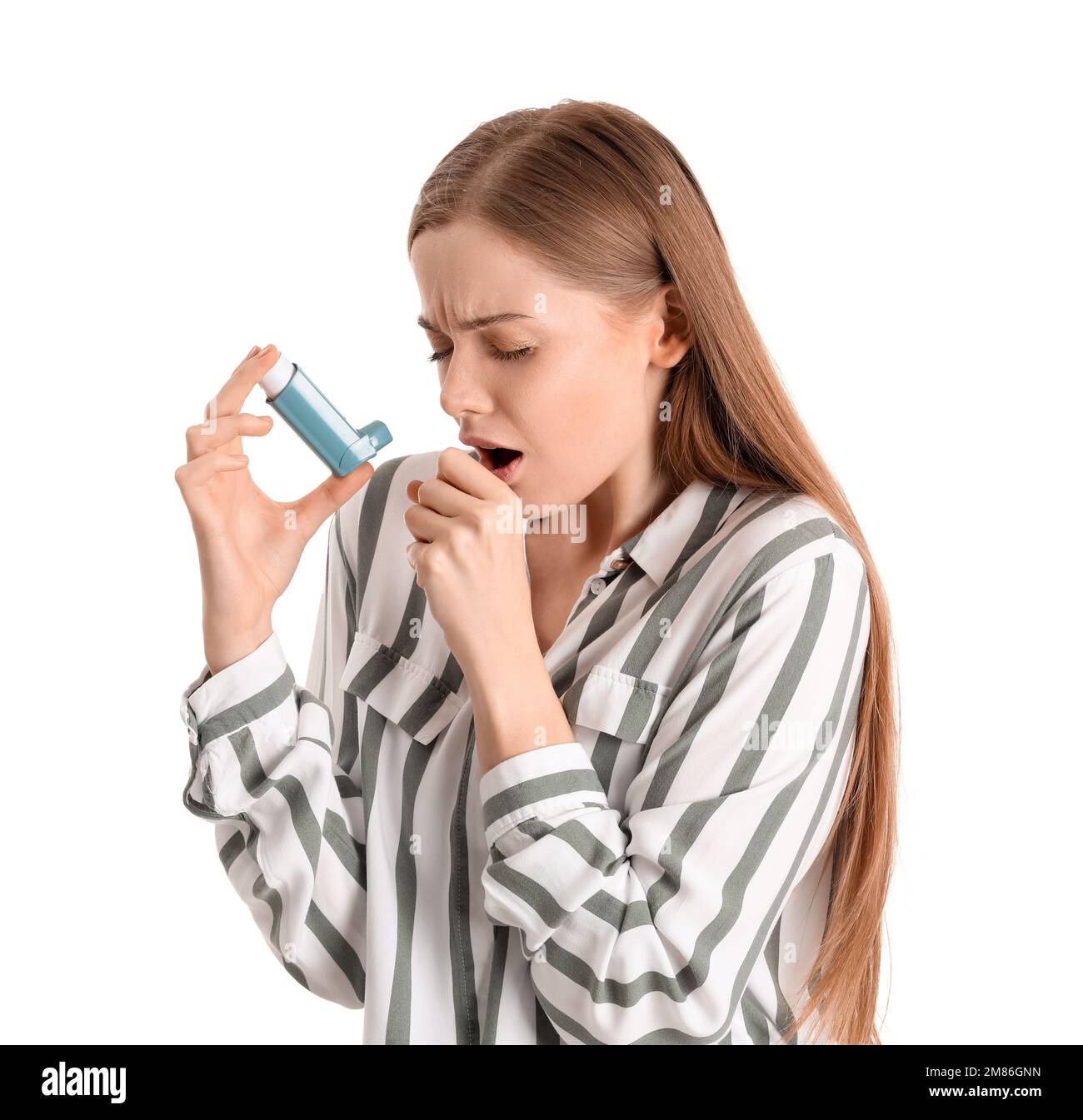 Sick young woman with inhaler on white background Stock Photo - Alamy