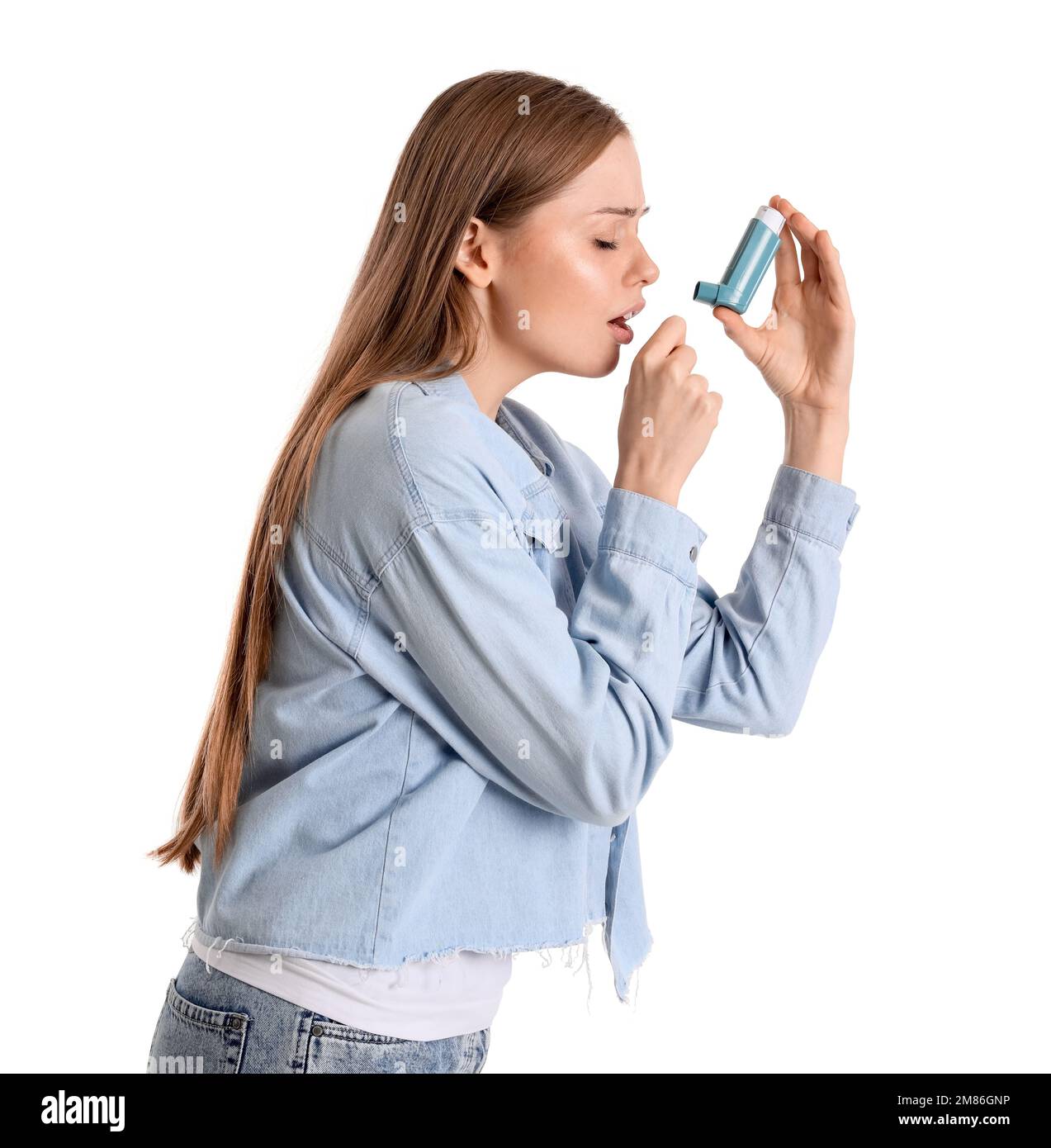 Sick young woman with inhaler on white background Stock Photo - Alamy